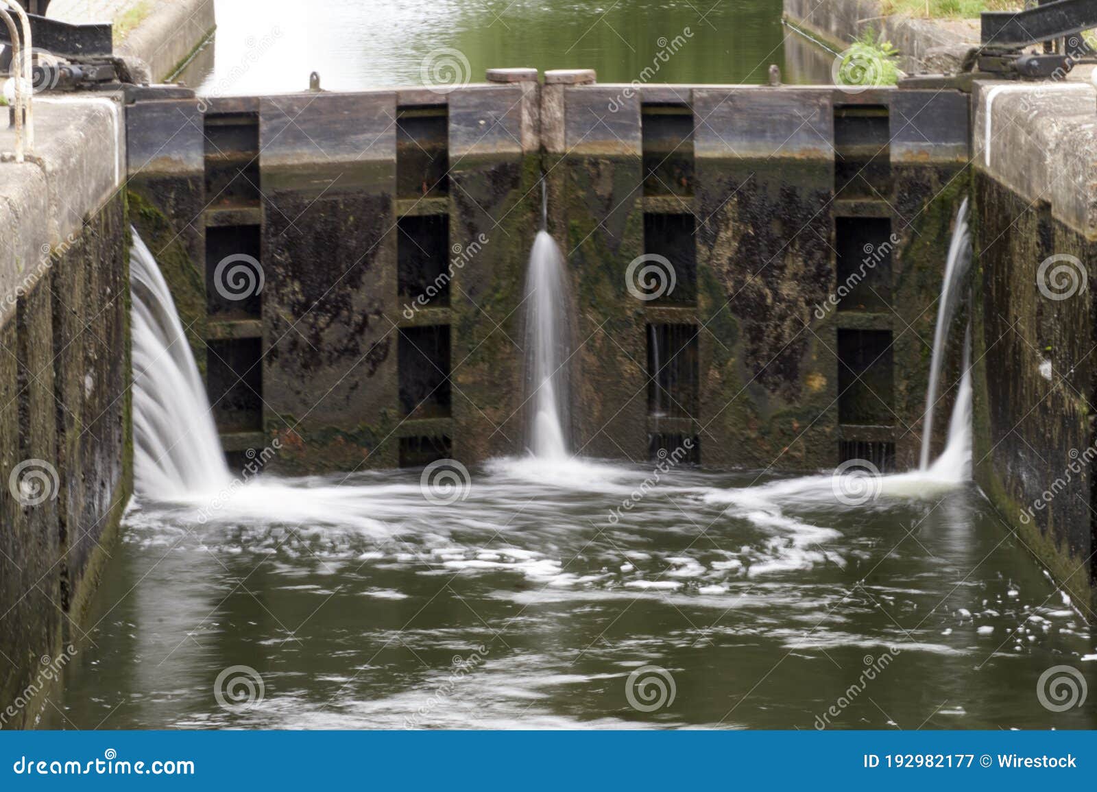 Shot of the River Water Spilling Out through a Metal Wall Stock Image ...