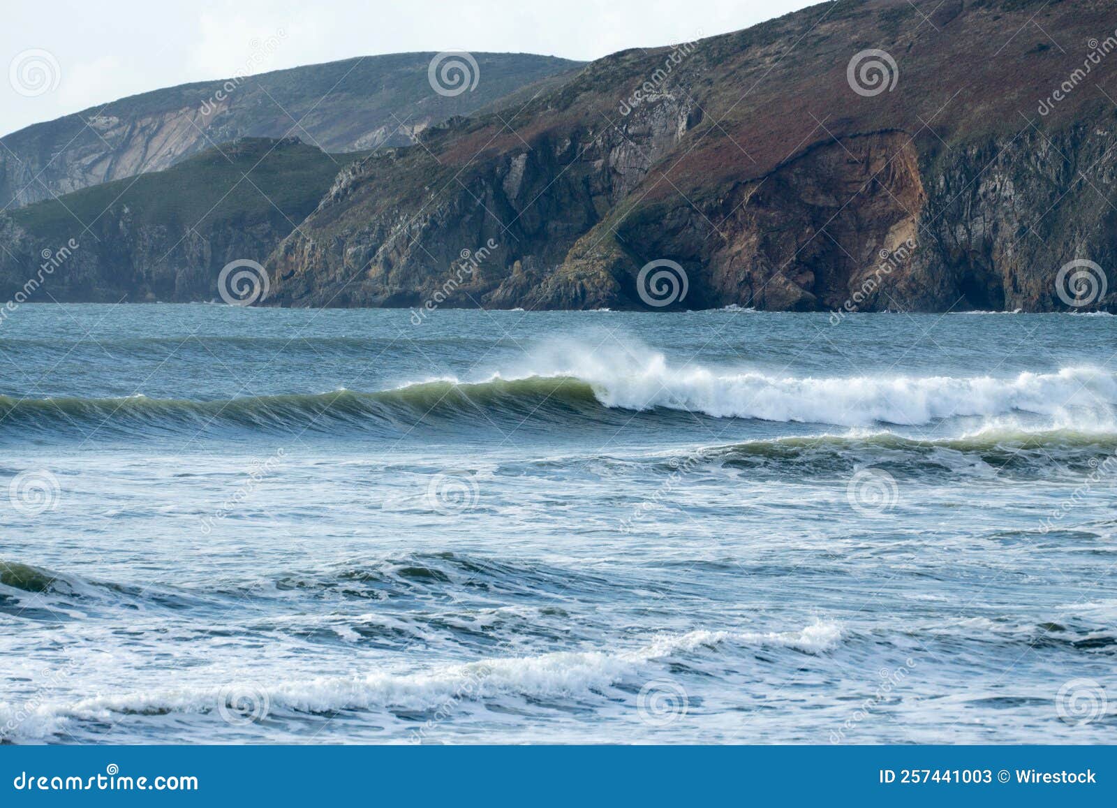 Shot of Roaring Stormy Sea Waves with Background of Beautiful Rocks ...