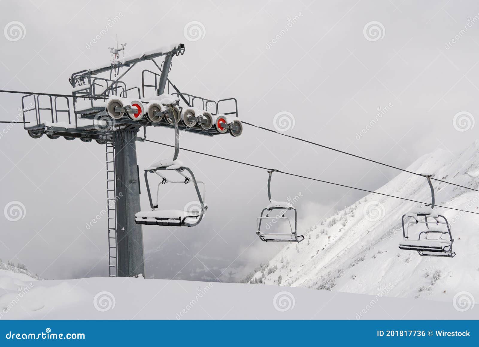 Shot of a Ropeway Covered with Snow on Foggy Weather Stock Photo ...