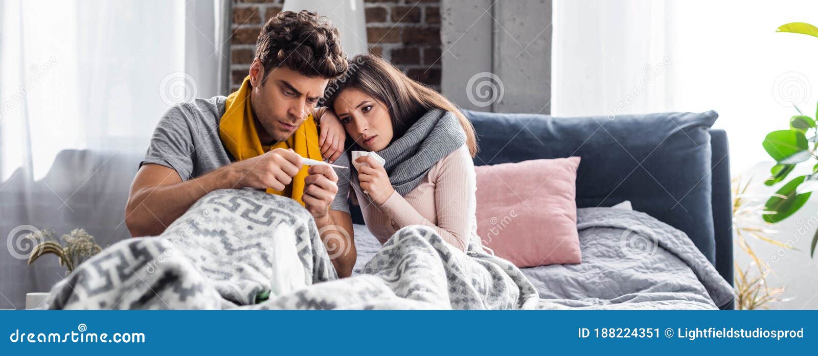 Shot of Sick Girlfriend and Boyfriend Looking at Thermometer Stock ...