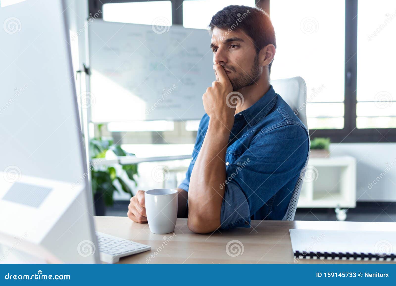 Software Developer Thinking in New Project while Working with Computer ...