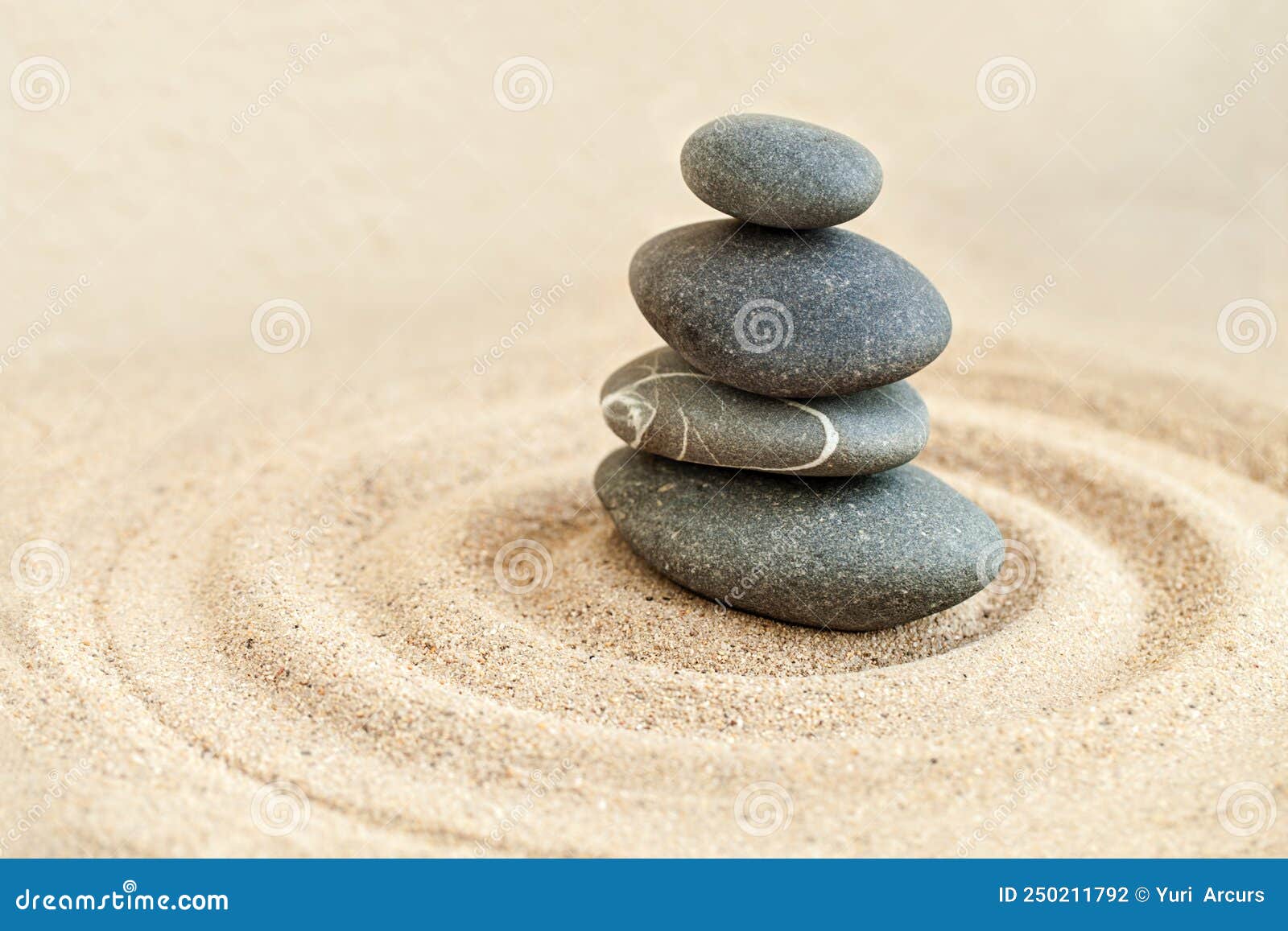 Sandy Serenity. Shot of a Stones Stack in Sand. Stock Photo - Image of ...
