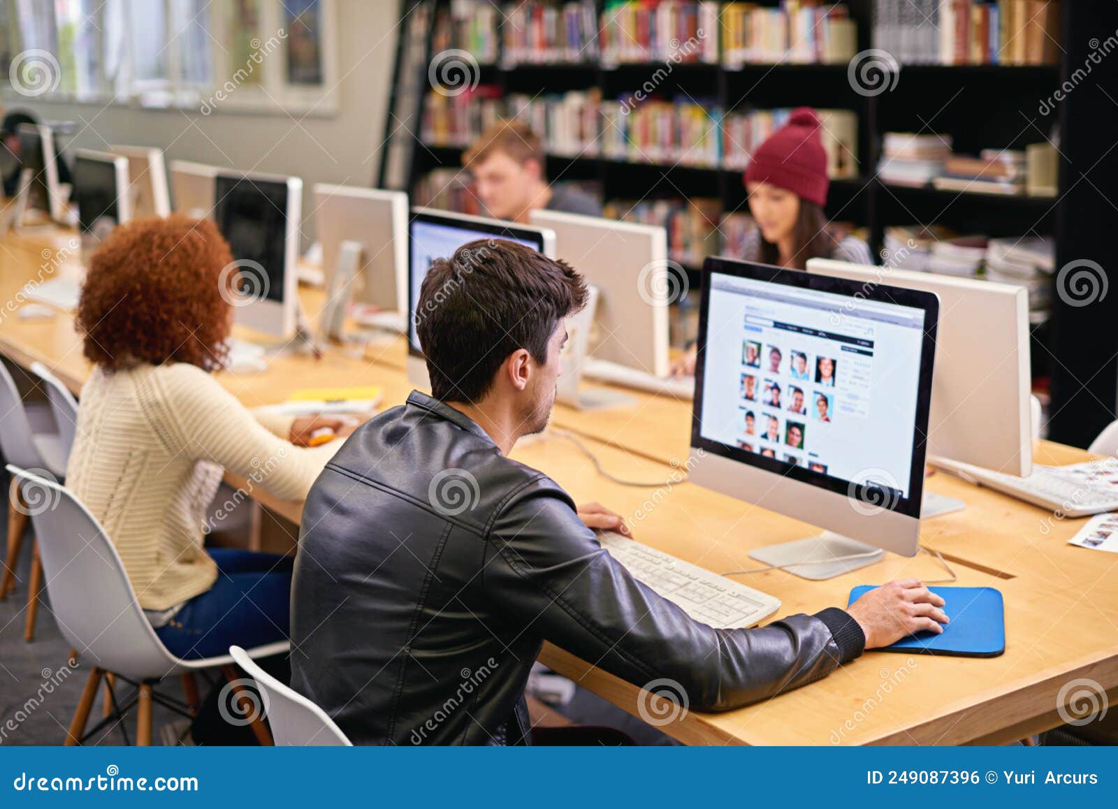 Gathering Information for His Research Project. Shot of Students ...