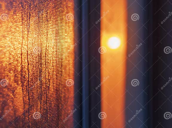 Shot of the Sun Setting and Reflecting in the Window. Concept Stock ...