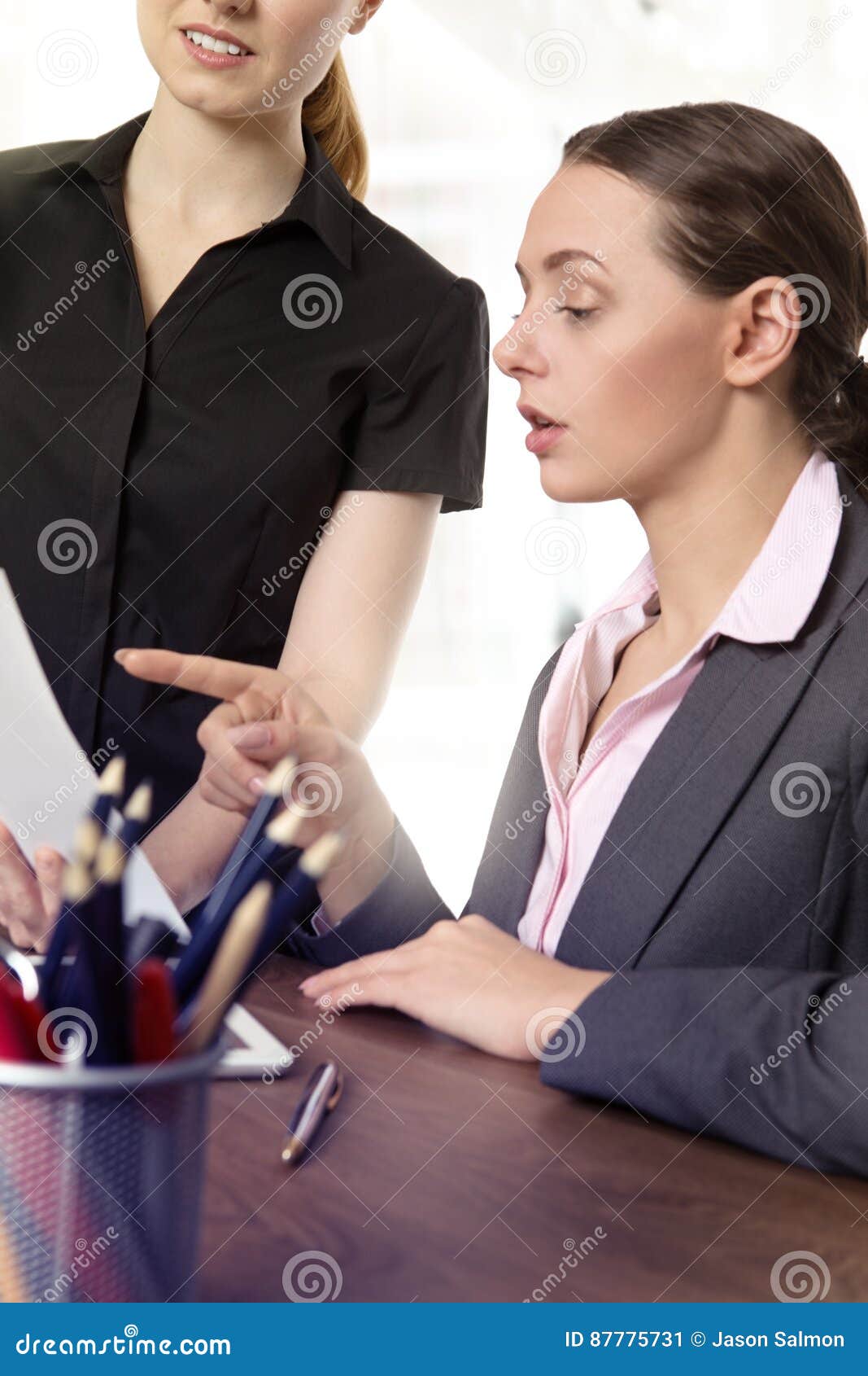 Office Women Looking at Documents Stock Image - Image of sitting ...