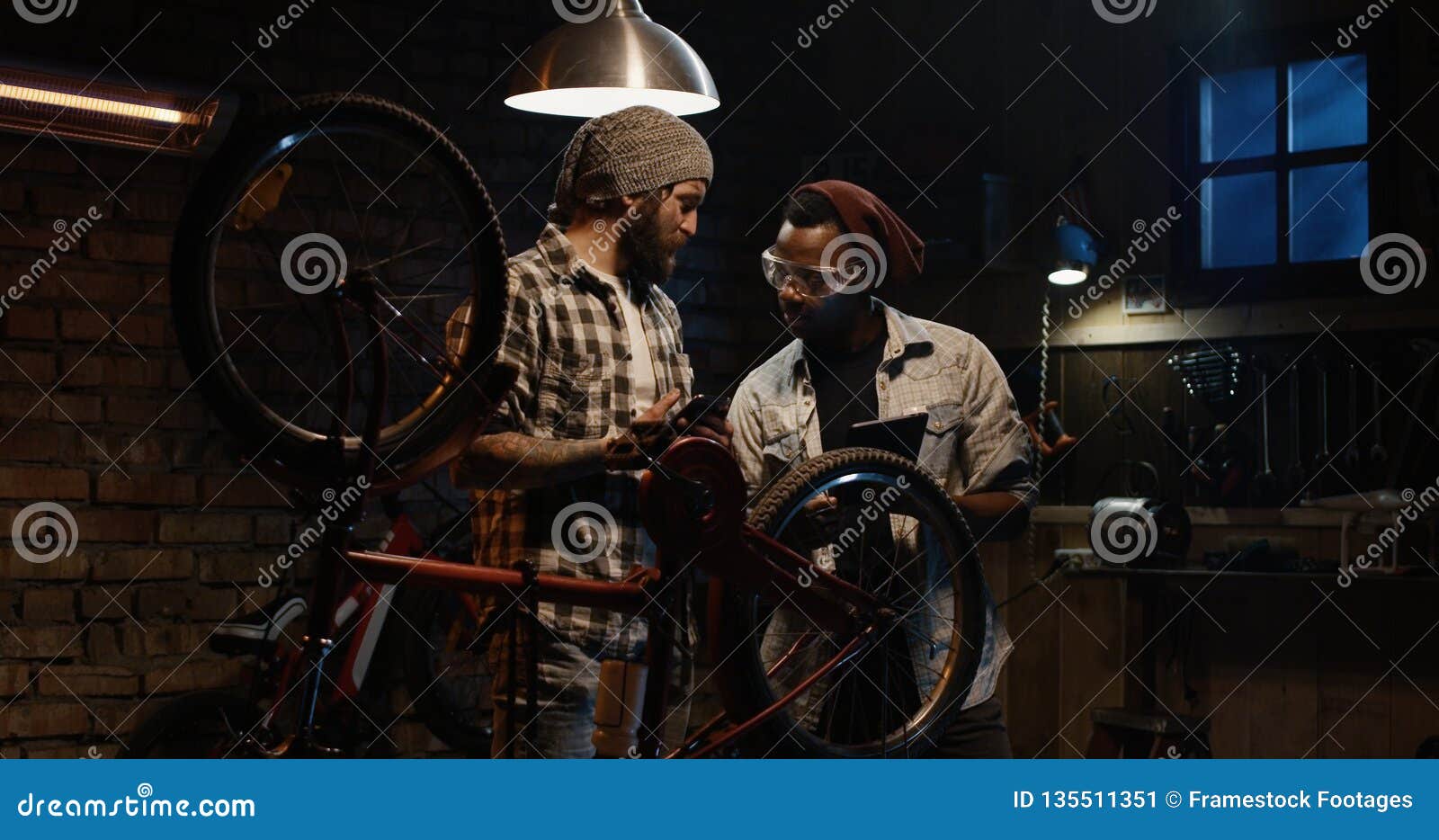 Two Mechanic Talking in a Workshop Stock Image - Image of conversation ...
