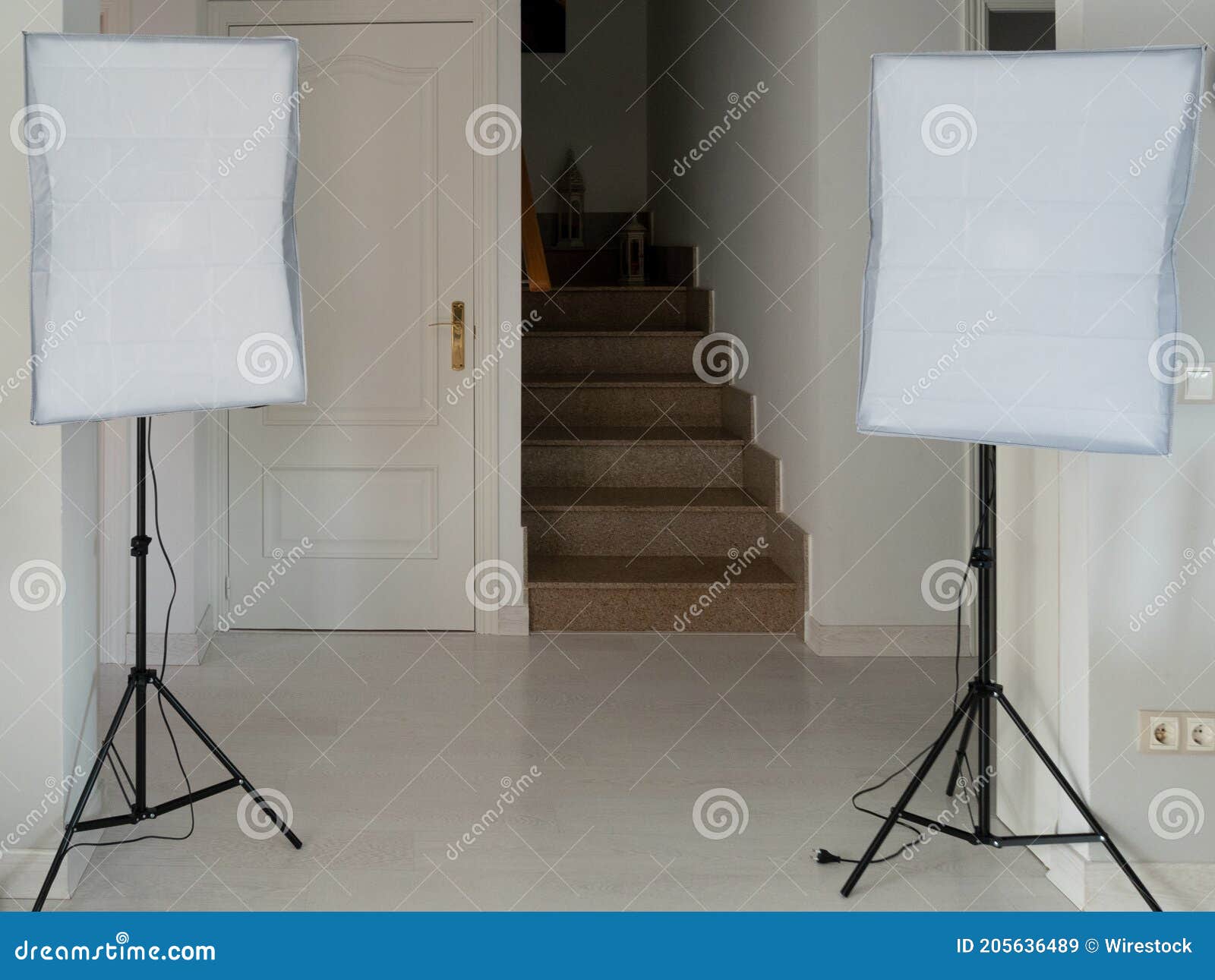 Shot of Two Softboxes Standing in the White Corridor of the House in ...