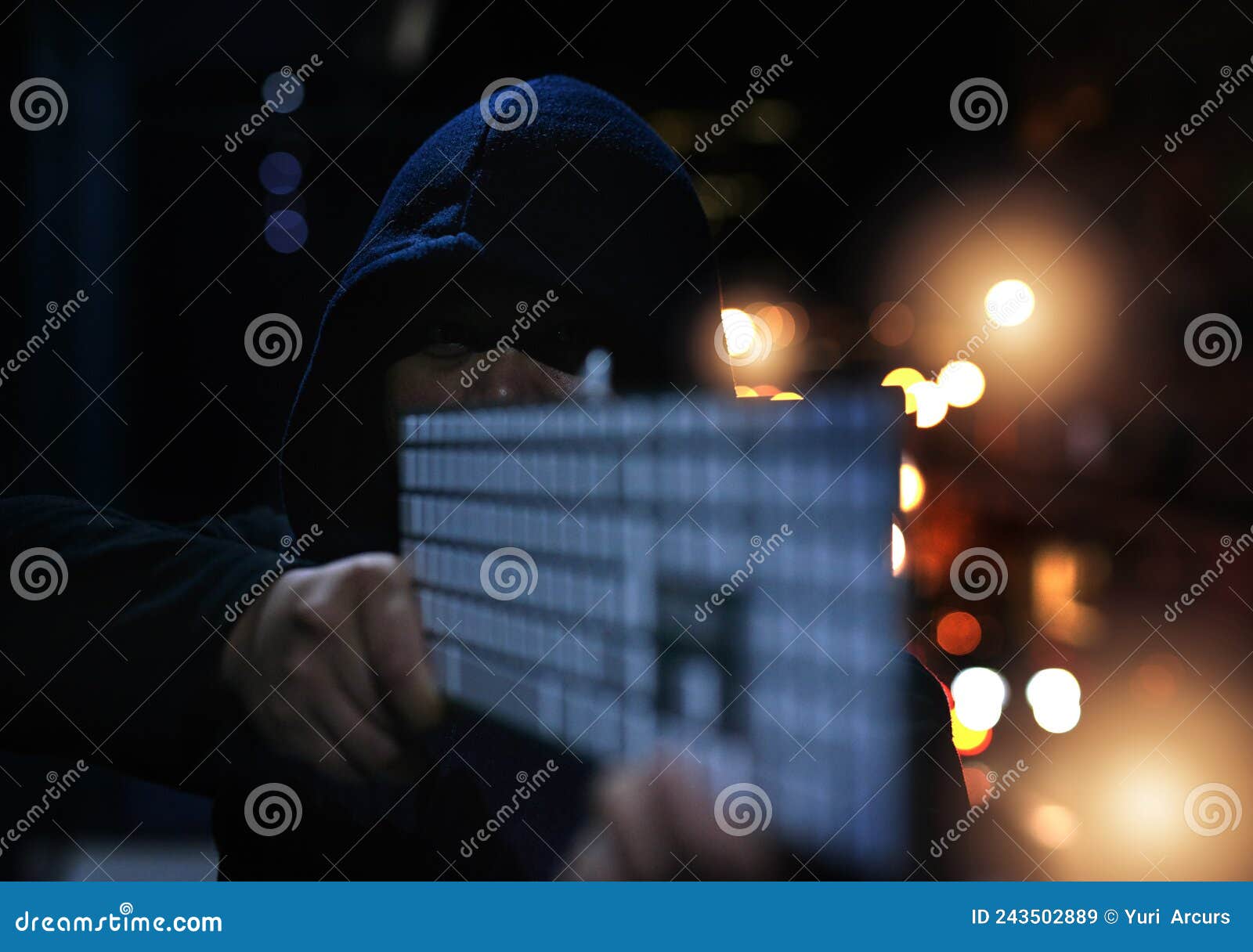 Armed and Ready To Destroy Your Data. Shot of an Unrecognisable Hacker ...