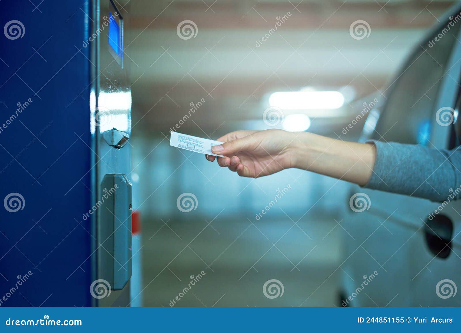 Just Out of Reach. Shot of an Unrecognizable Driver Inserting a Ticket ...