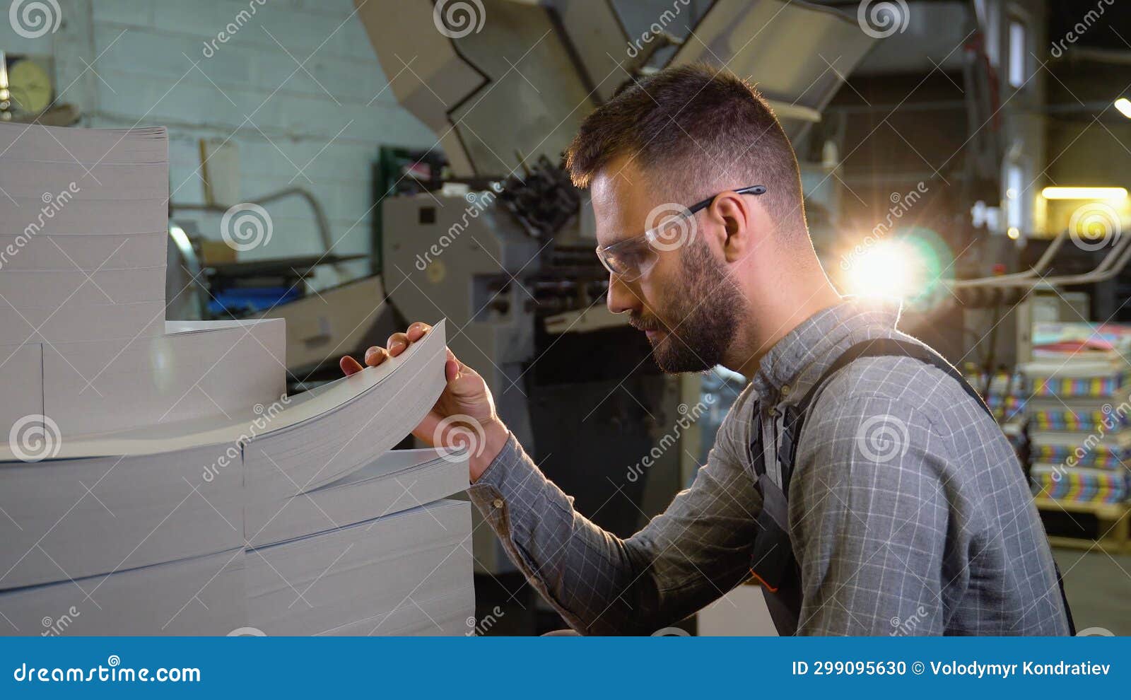 Print Worker Ready To Place Blank Sheets of Paper into Offset Machine ...