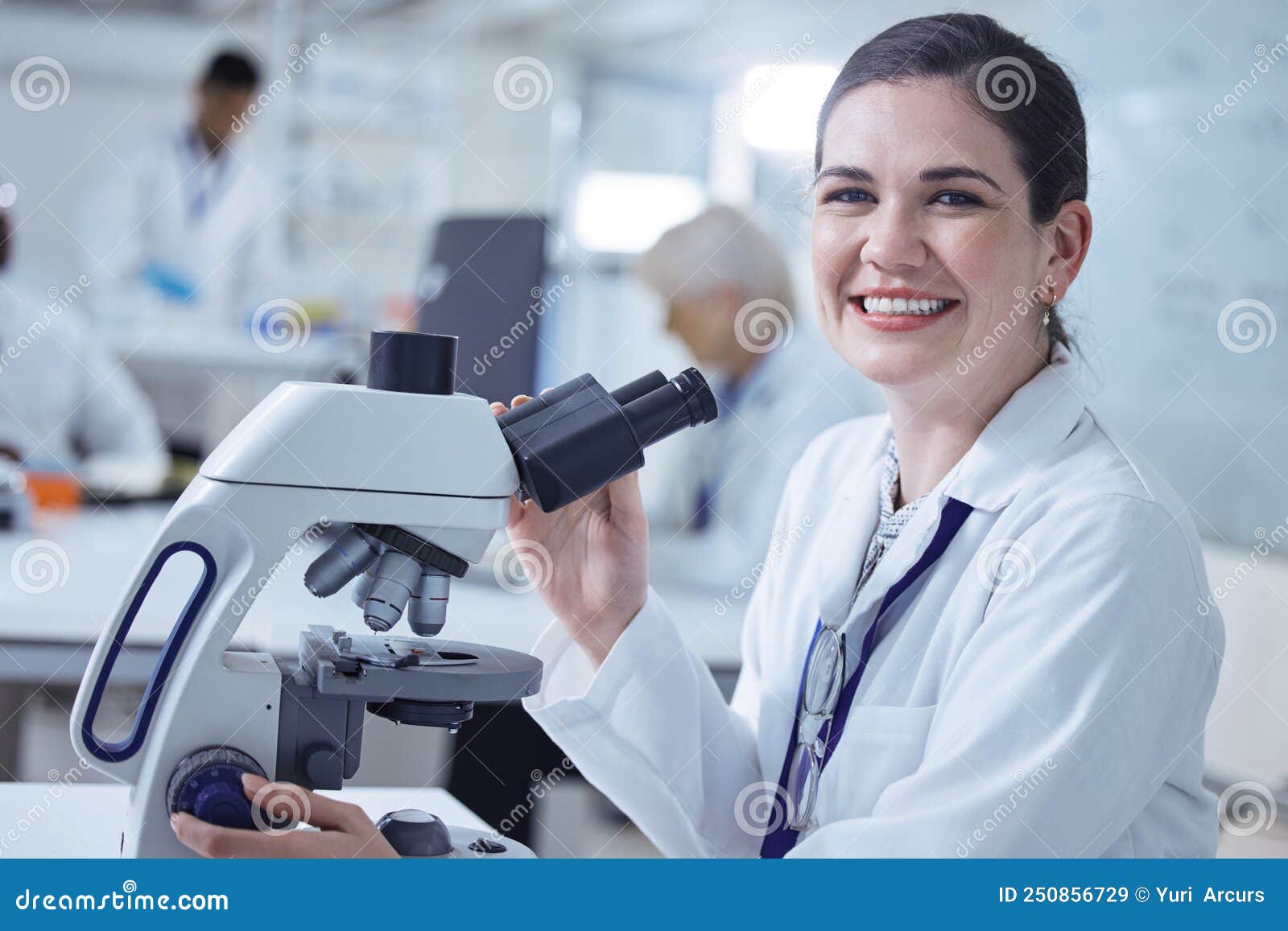 Youll Never Guess What Ive Found. Shot of a Young Female Lab Tech Using ...