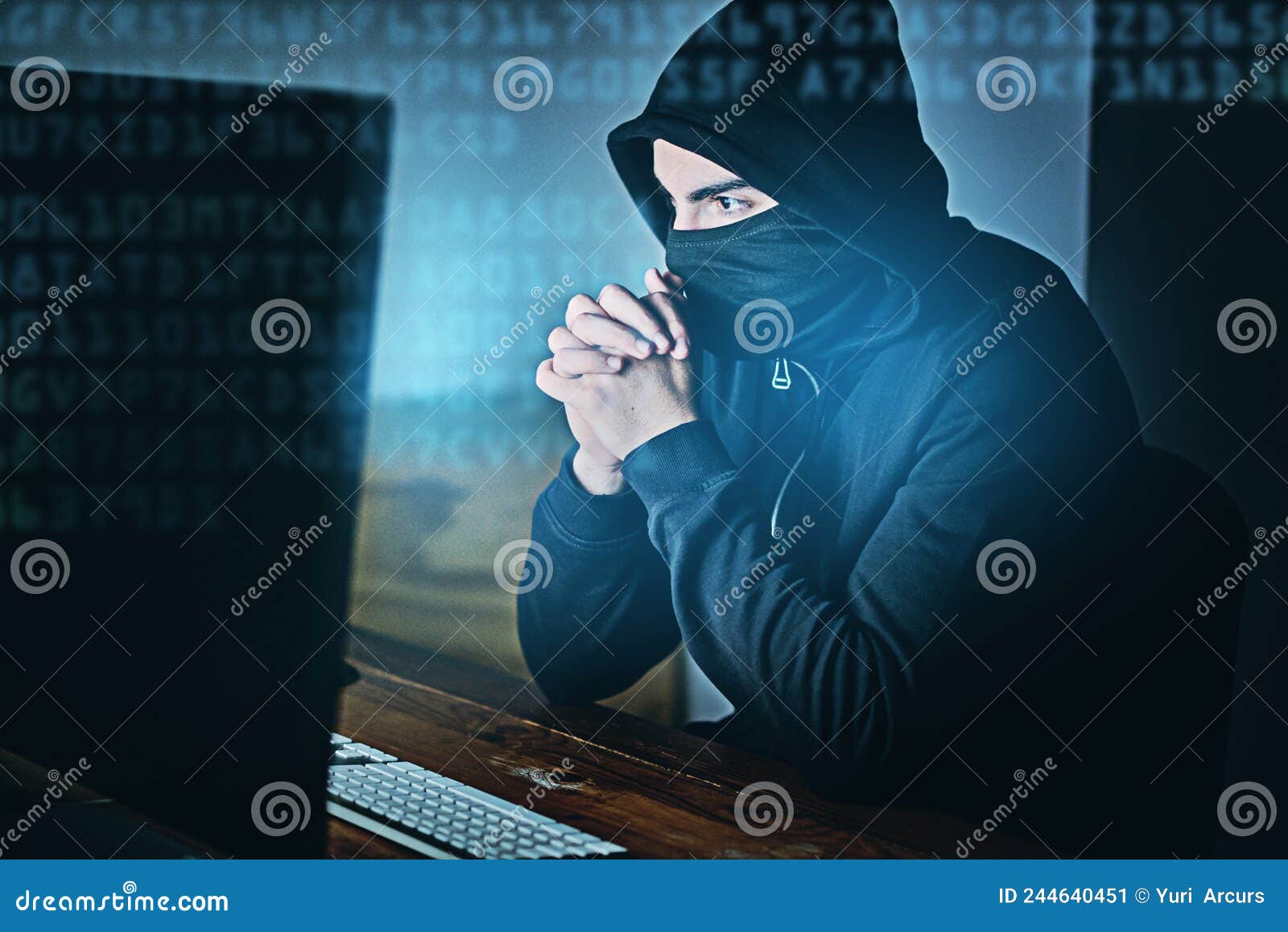 Some Clicks and Youre Hacked. Shot of a Young Hacker Using a Computer ...