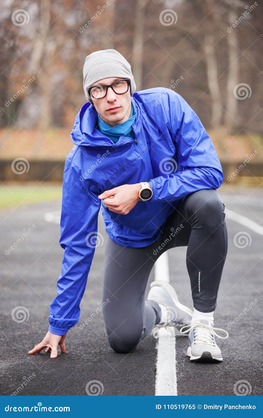 Shot of a Young Handsome Professional Runner Looking at Camera. Stock ...