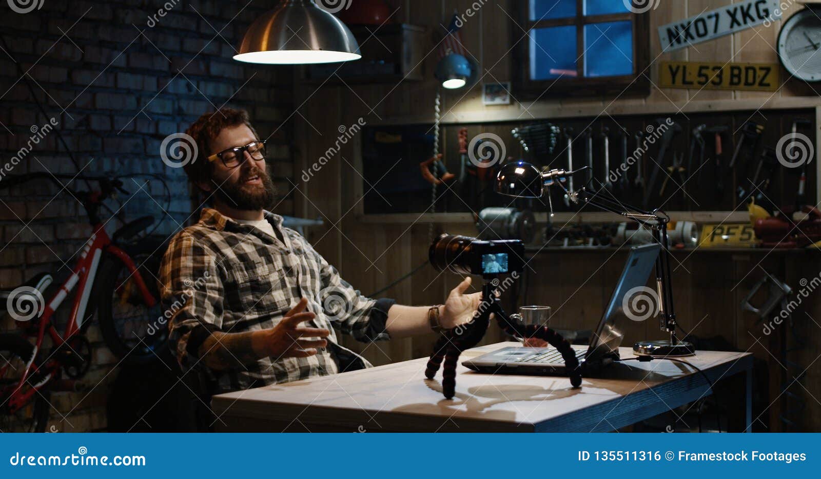 Young Man Talking on Camera in a Workshop Stock Photo - Image of vlog ...