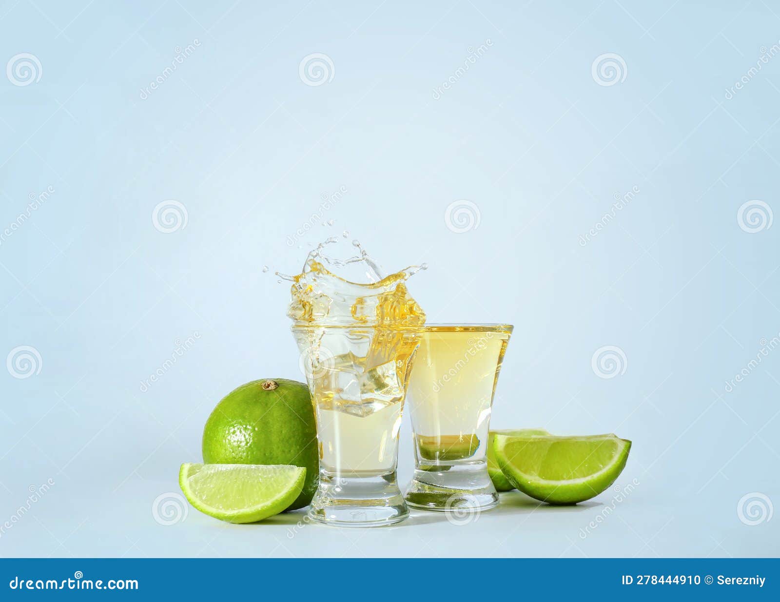 Shots of Tequila with Splashes on Light Background Stock Photo - Image ...