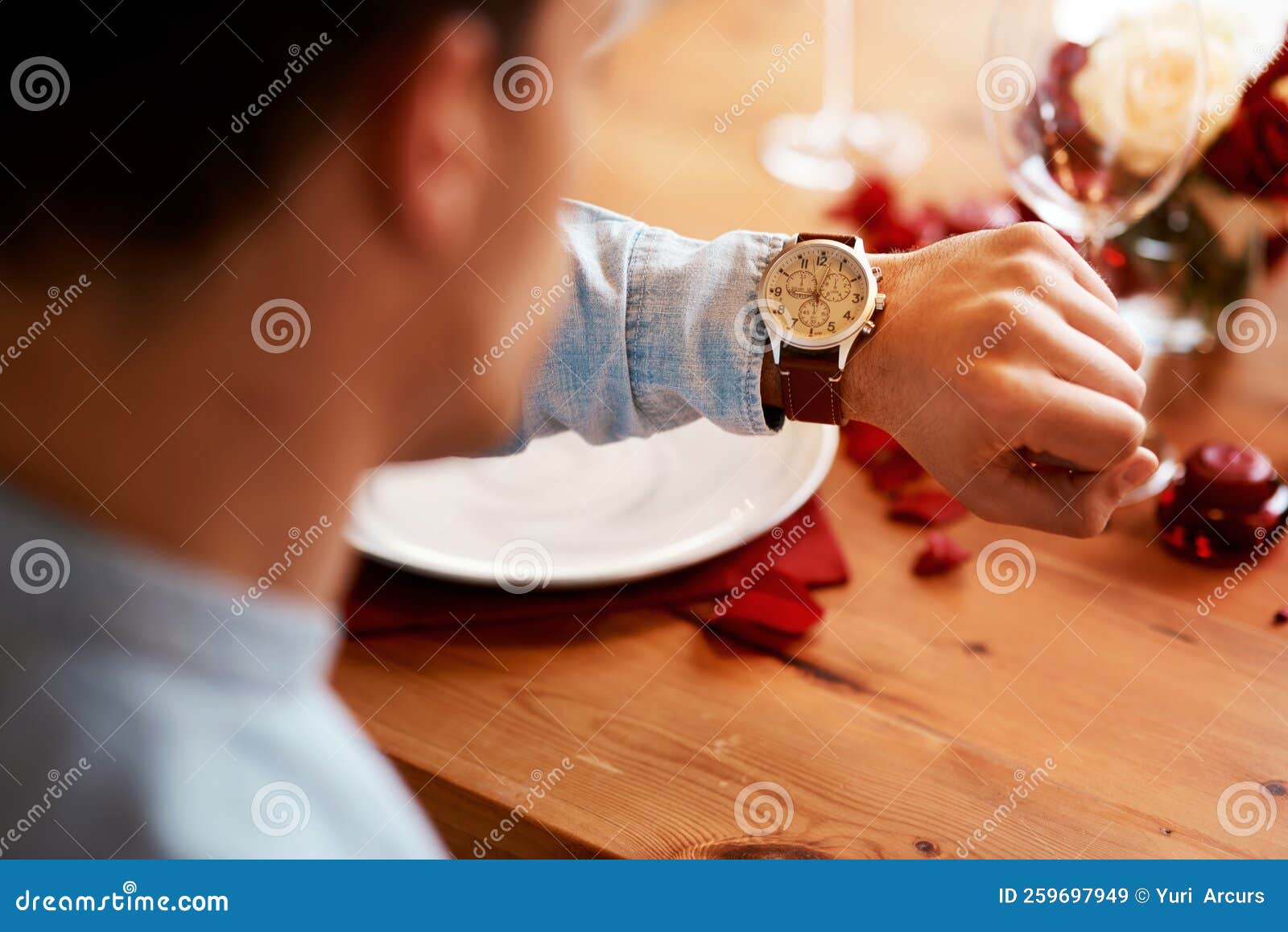 She Should Arrive Any Minute Now. a Man Checking the Time while Waiting ...
