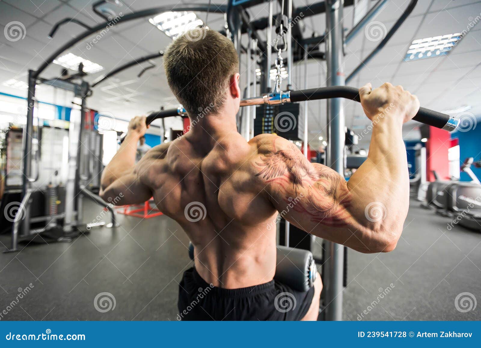 Shoulder Pull Down Machine. Fitness Man Working Out Lat Pulldown ...