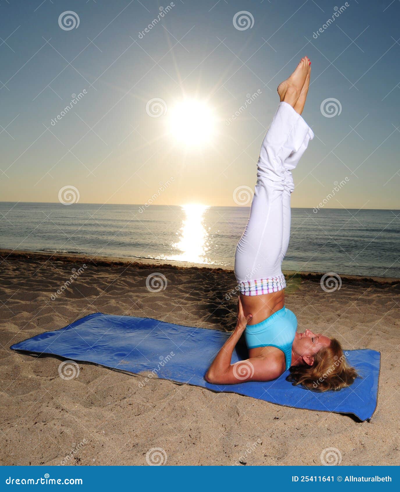Shoulder stand yoga pose stock image. Image of adult - 25411641