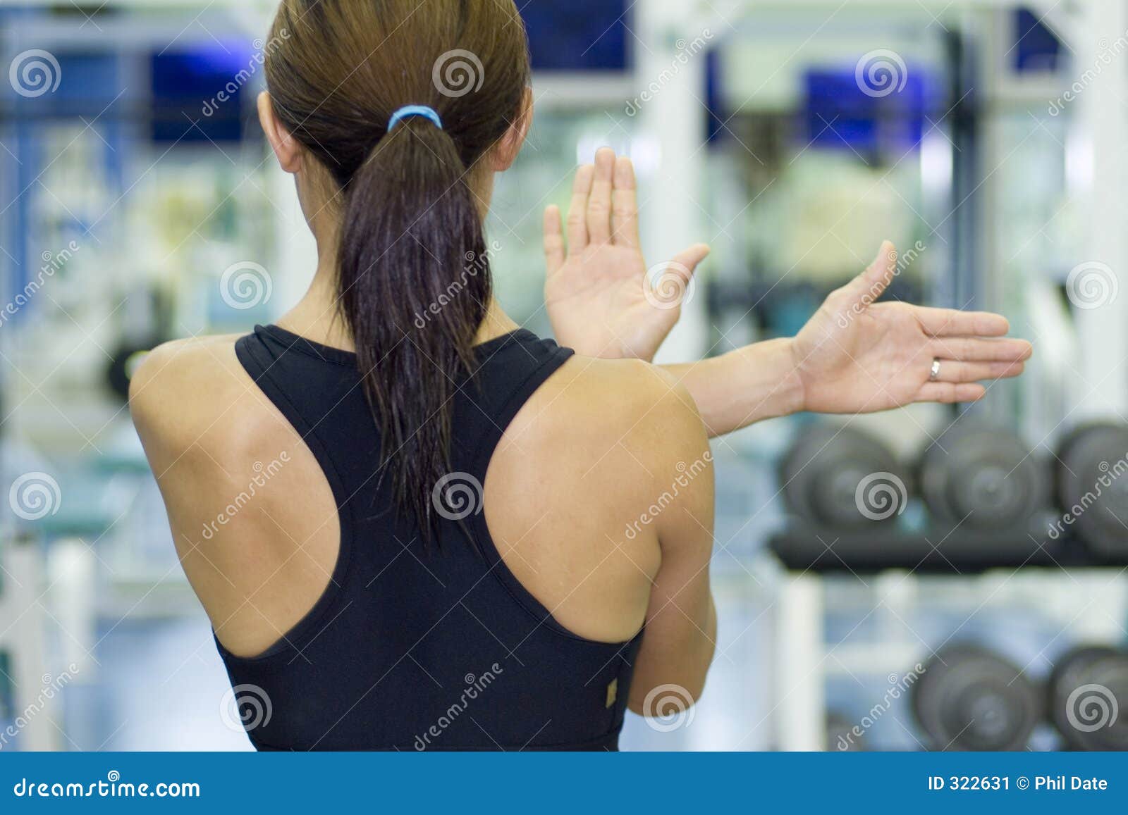 Shoulder Stretch in Gym stock image. Image of resistance - 322631