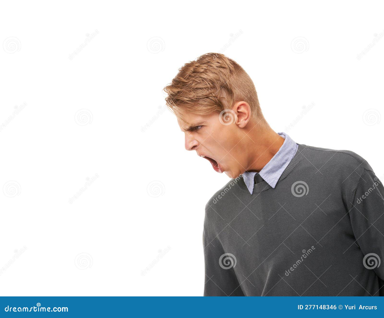 Shouting Down at the Competition. Studio Shout of a Young Man Angrily ...