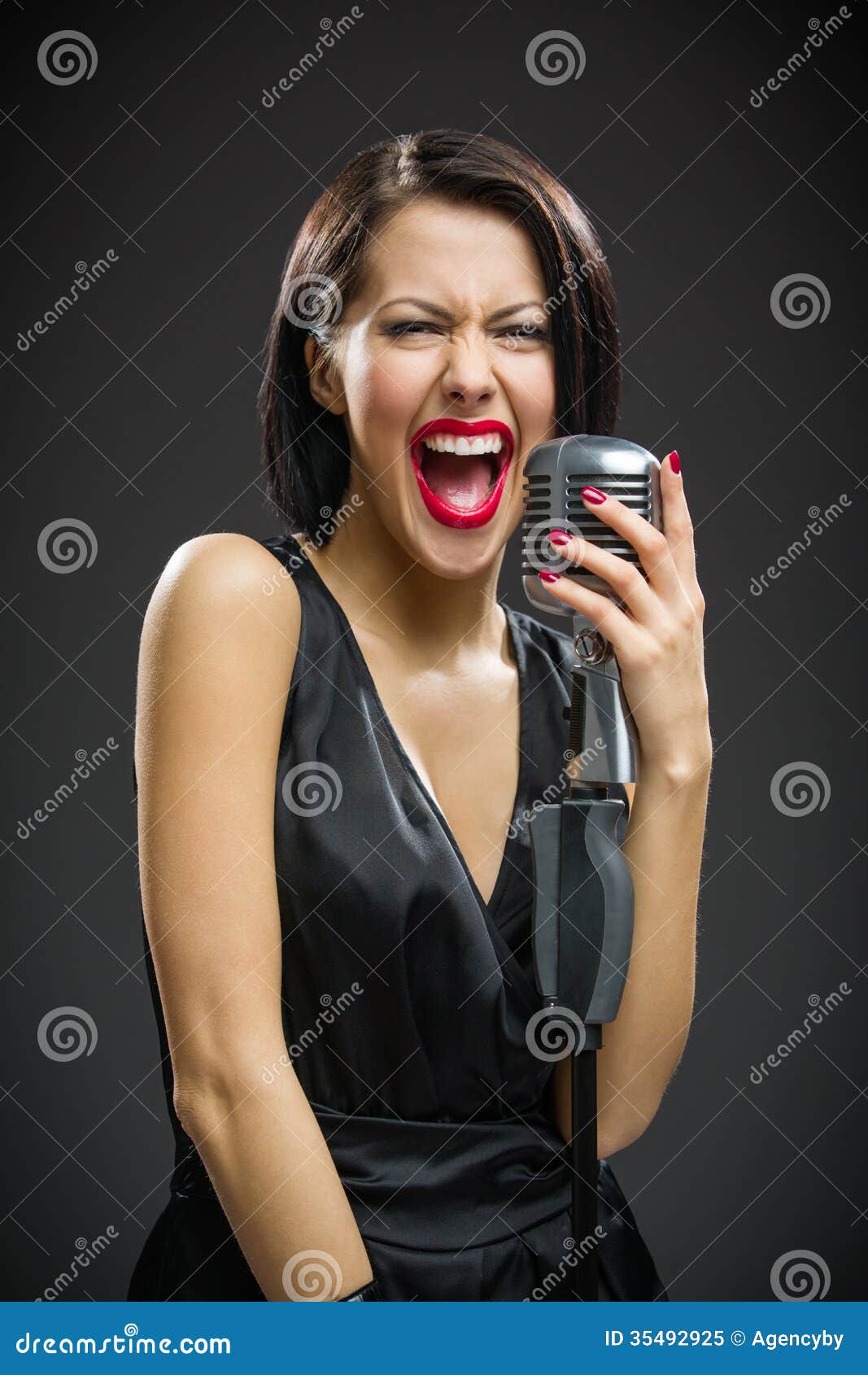 Shouting Female Singer Keeping Microphone Stock Image - Image of ...