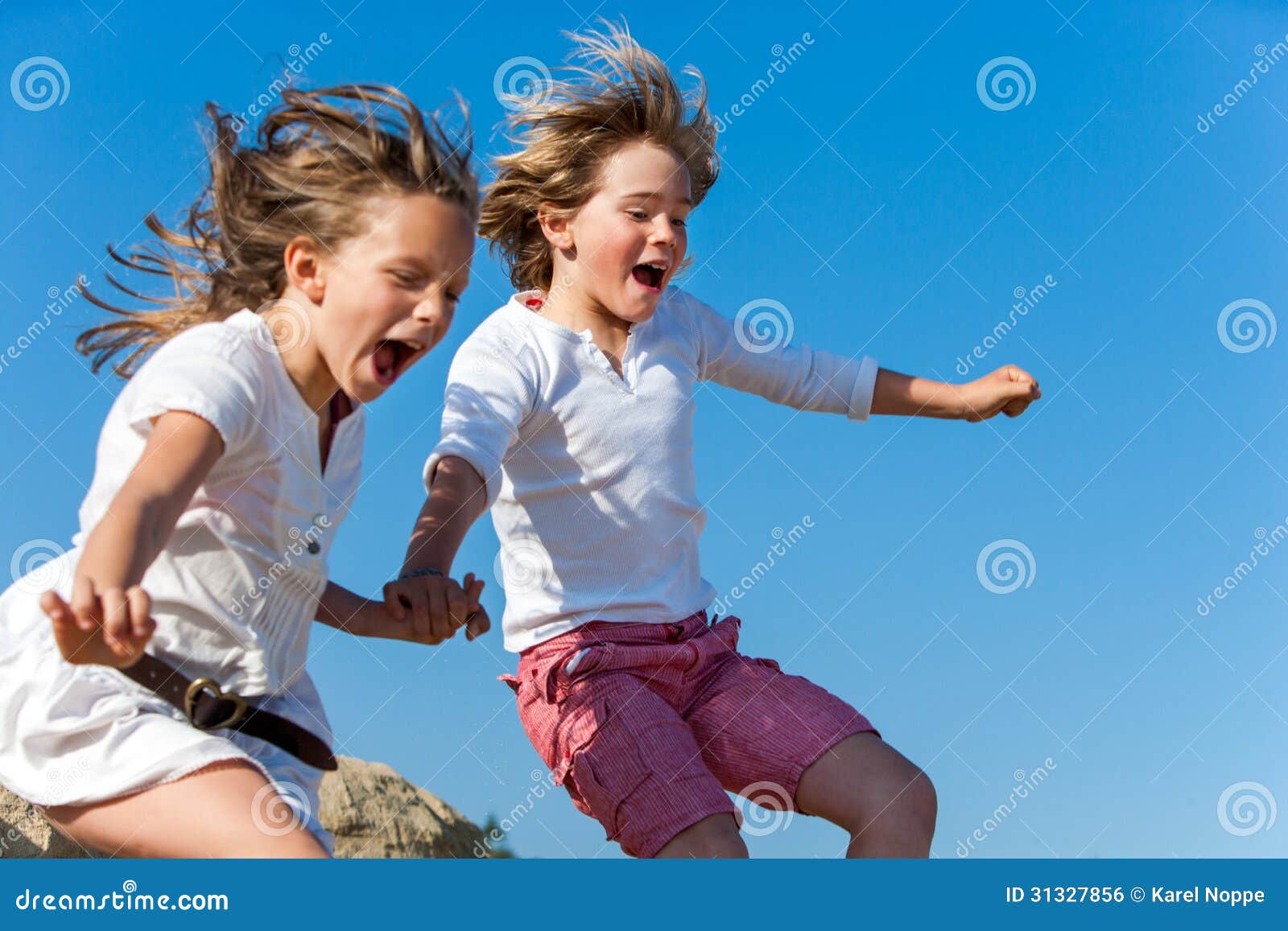 Shouting Kids Having Fun Jumping. Stock Photo - Image of dynamic ...