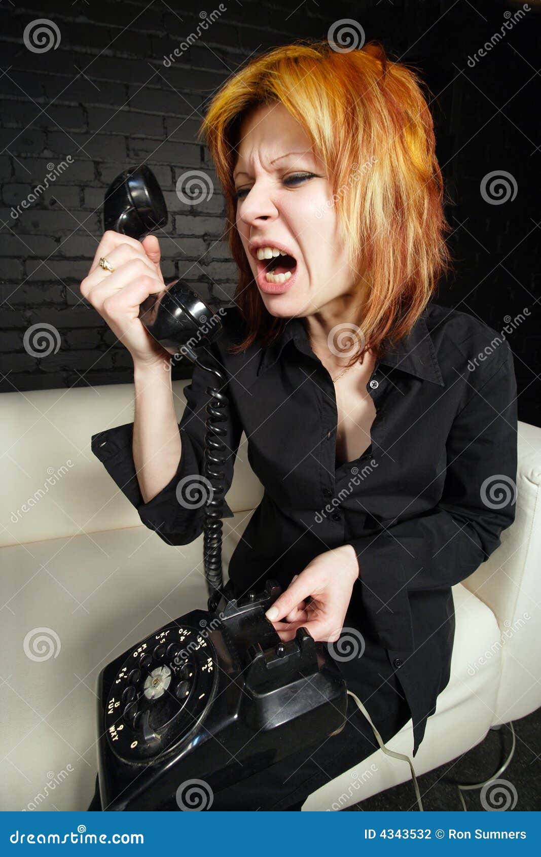 Shouting into the phone stock photo. Image of couch, portrait - 4343532