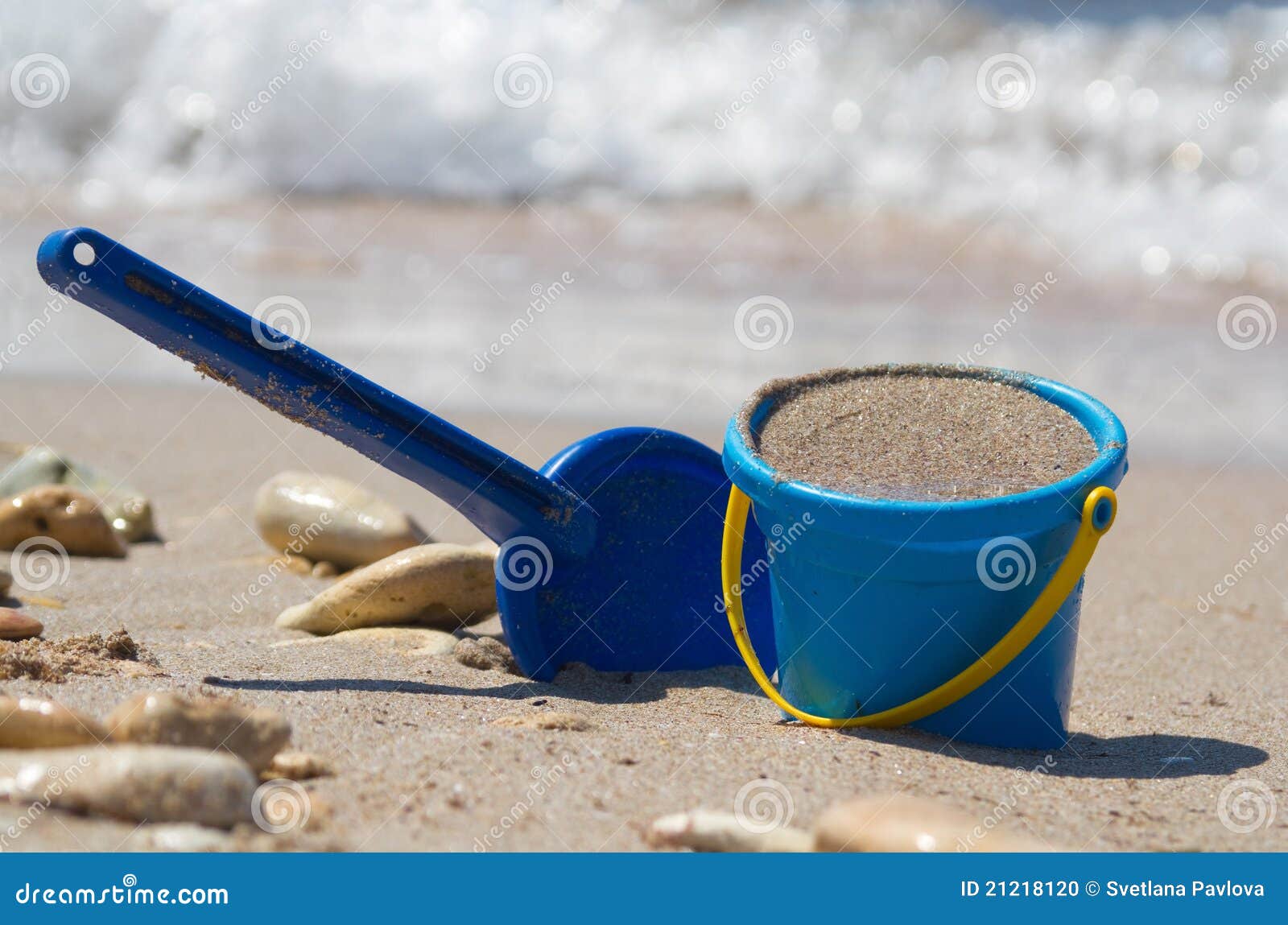 Shovel and bucket on sand stock photo. Image of plastic - 21218120