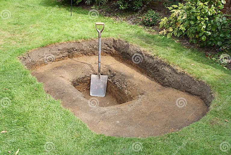 Shovel in hole for pond stock image. Image of pond, earth - 15914103