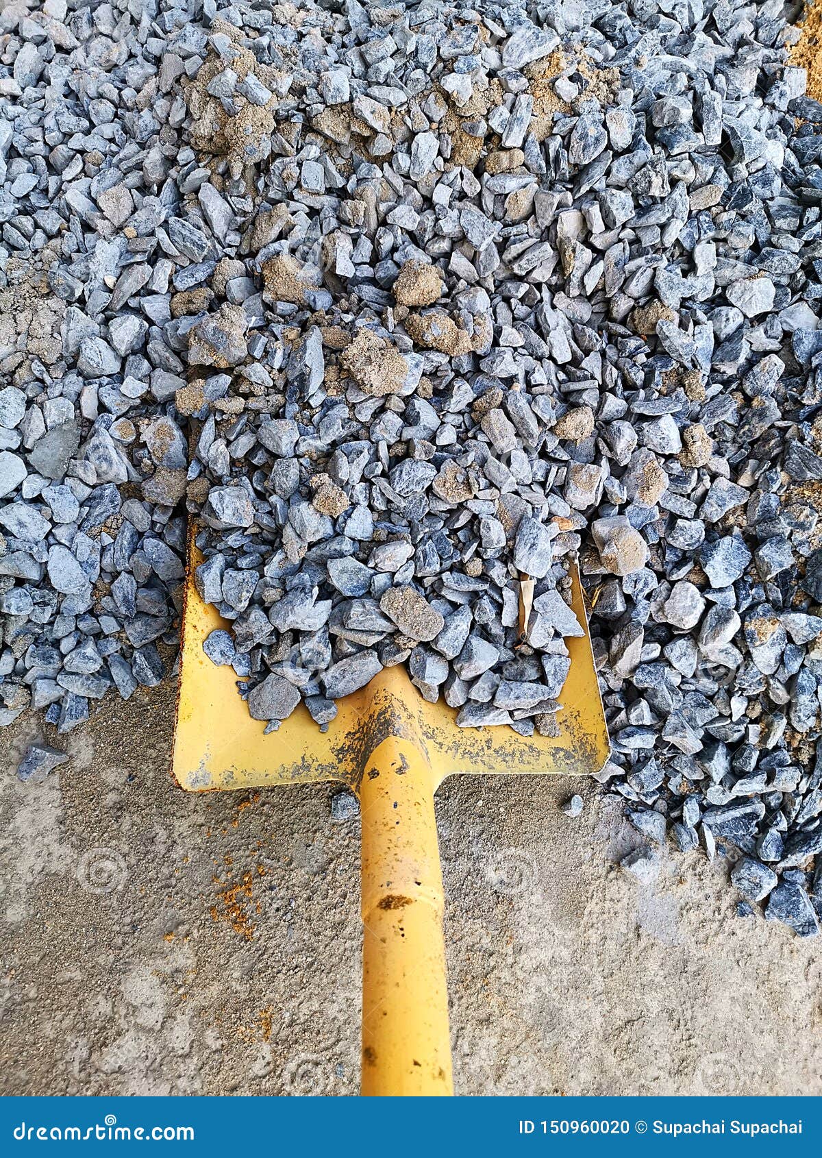 Shovel Placed on a Pile of Stone for Construction Work. it is Used for ...