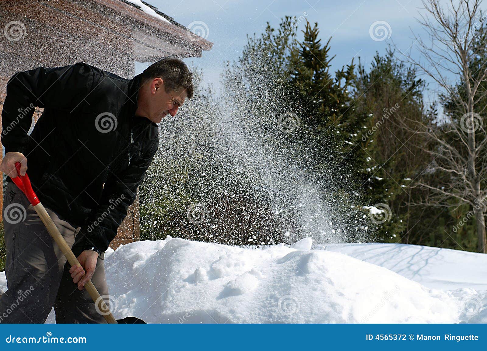 Shovelling can be fun! stock photo. Image of outdoors - 4565372