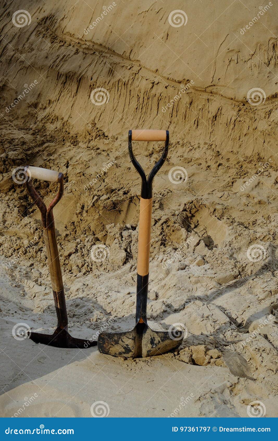 Shovels in the sand stock image. Image of snow, background - 97361797