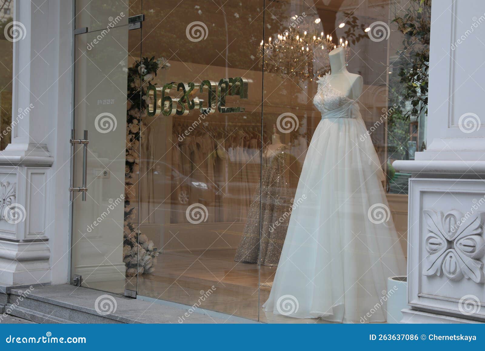 Showcase with Beautiful Wedding Dress on Mannequin Stock Photo - Image ...