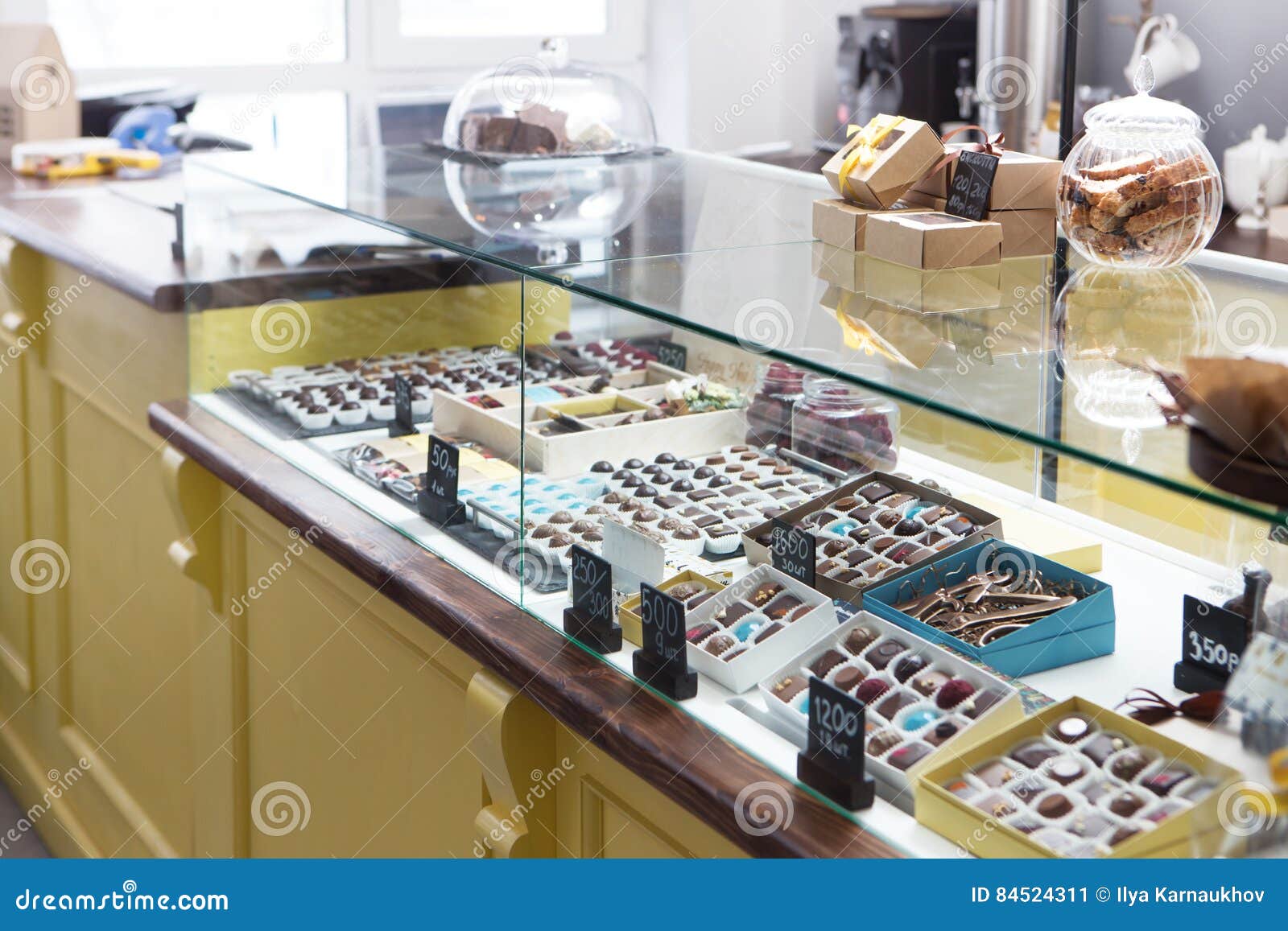 Showcase with chocolate stock image. Image of food, candy - 84524311