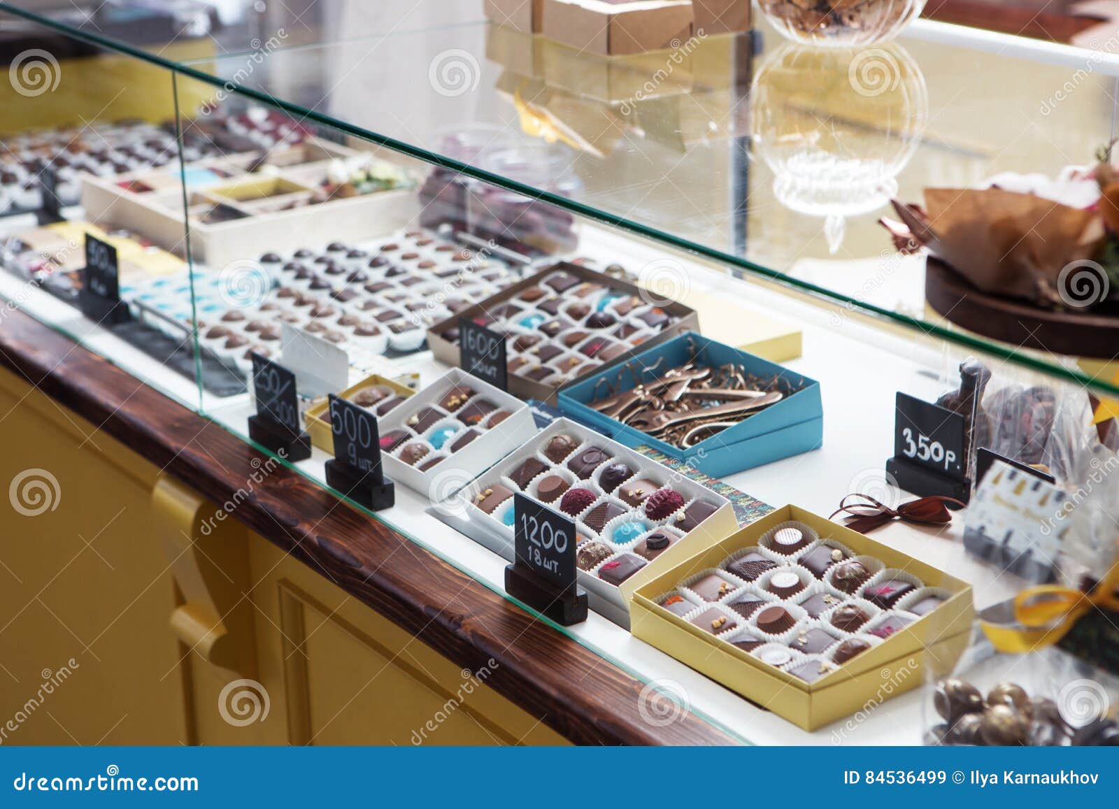 Showcase with chocolate stock image. Image of delicious - 84536499