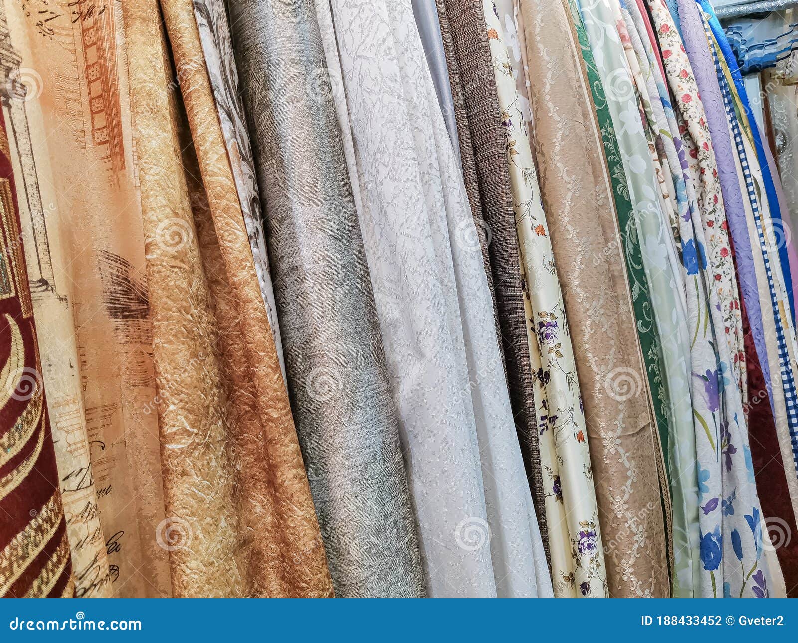 A Showcase of a Fabric Store Stock Photo - Image of hanger, abstract ...