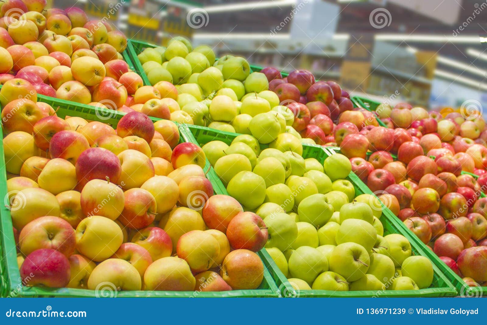 Showcase Filled with Multi-colored Apples of Different Varieties Stock ...