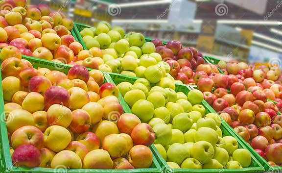 Showcase Filled with Multi-colored Apples of Different Varieties Stock ...