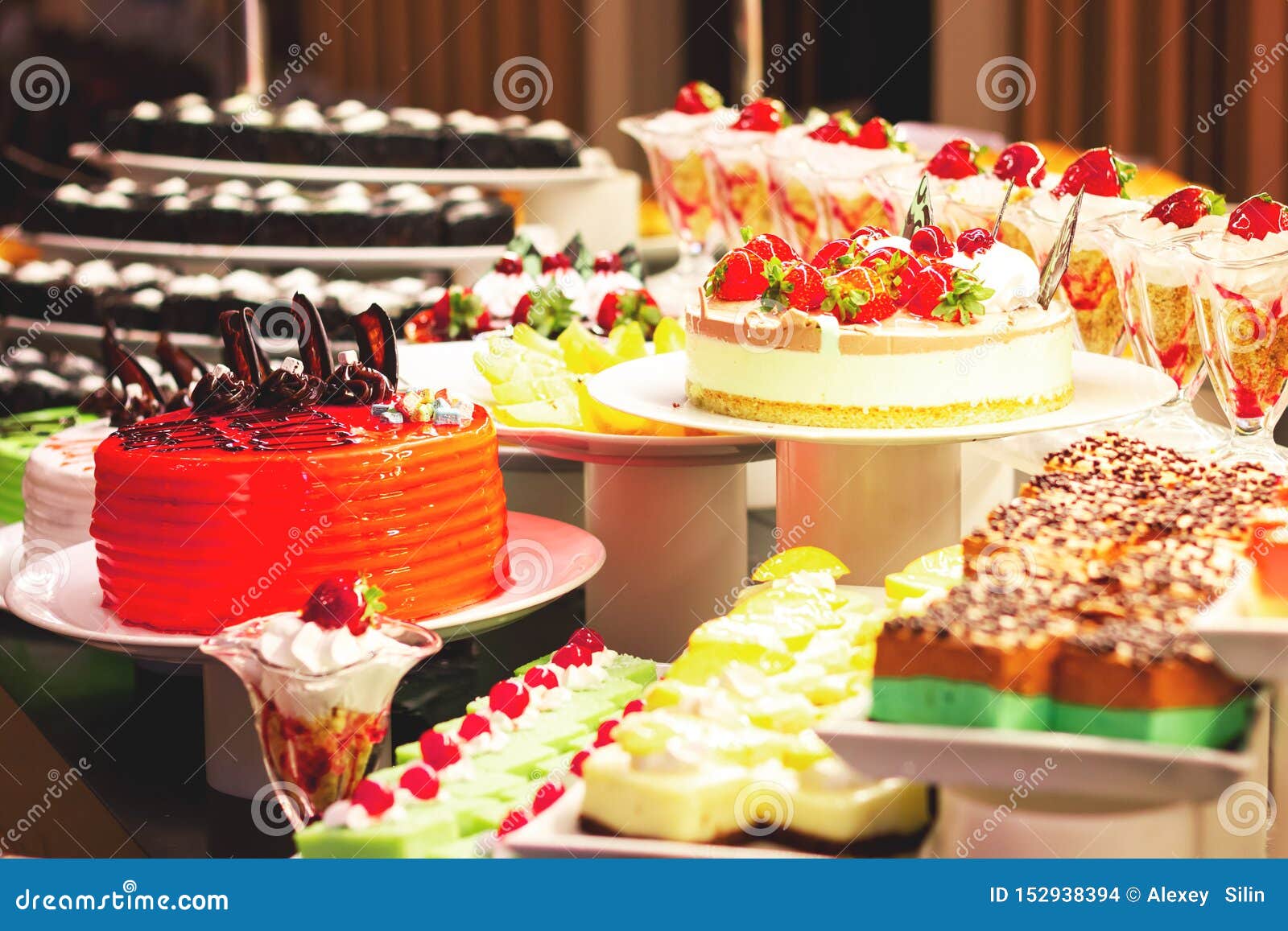 Showcase with many cakes. stock photo. Image of display - 152938394