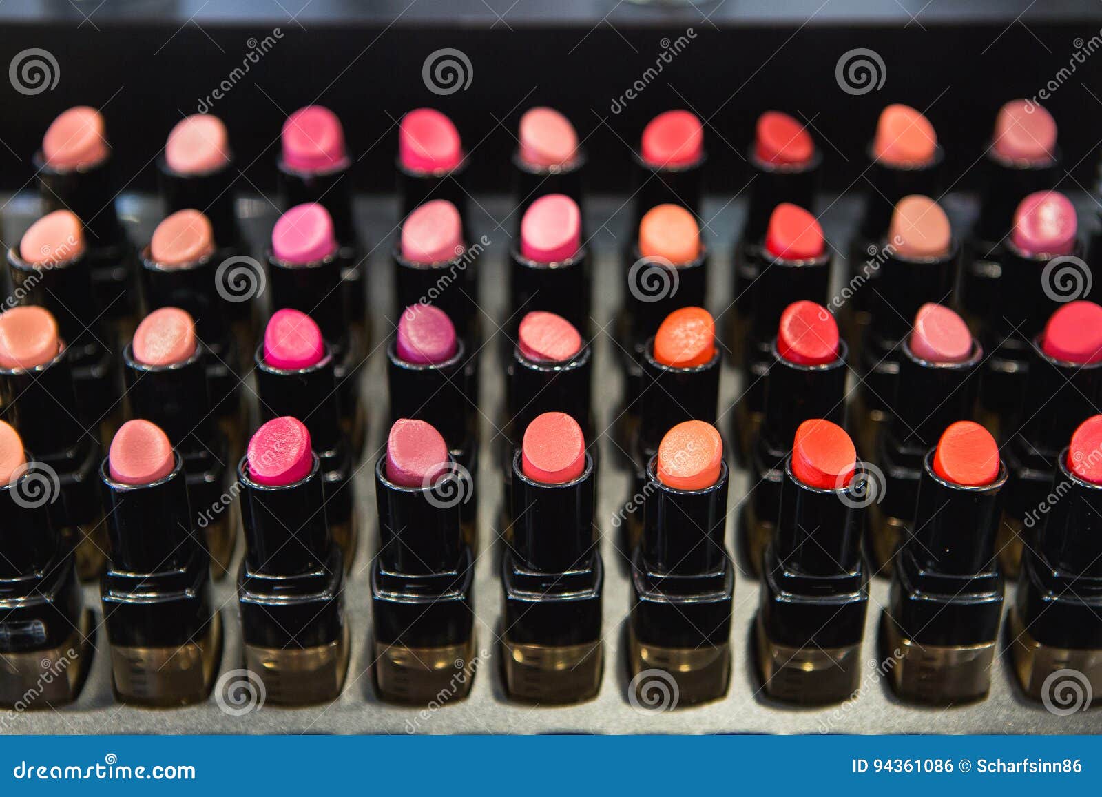 Showcase with Many Lipsticks Stock Photo - Image of black, cosmetic ...