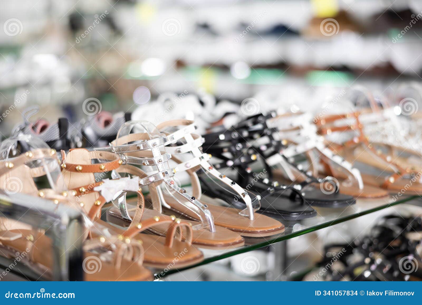 Showcase with Models of Sandals in Shoe Store Stock Photo - Image of ...