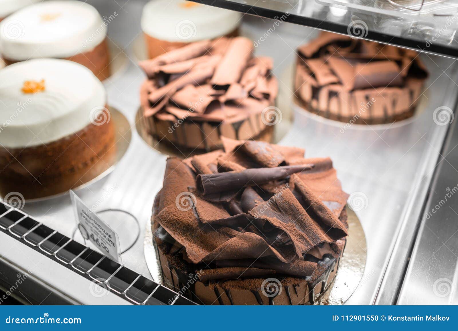 Showcase with Sweets. Cakes, Pastries, Biscuits. Small Cakes with ...