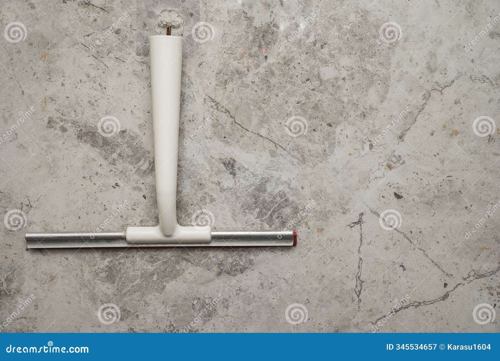 Shower Squeegee Hanging on the Wall in the Bathroom Stock Image - Image ...