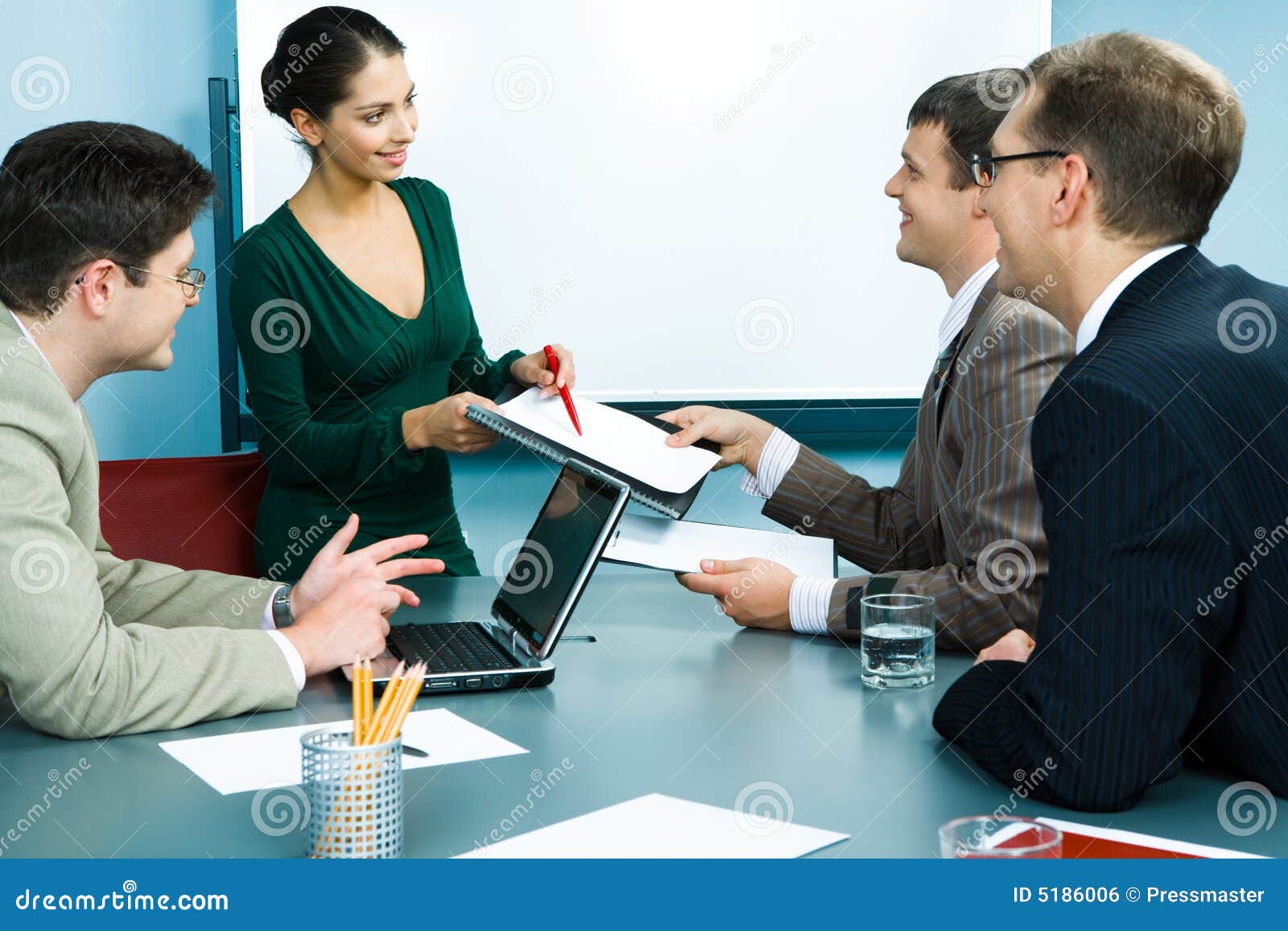 Showing business papers stock photo. Image of cooperation - 5186006