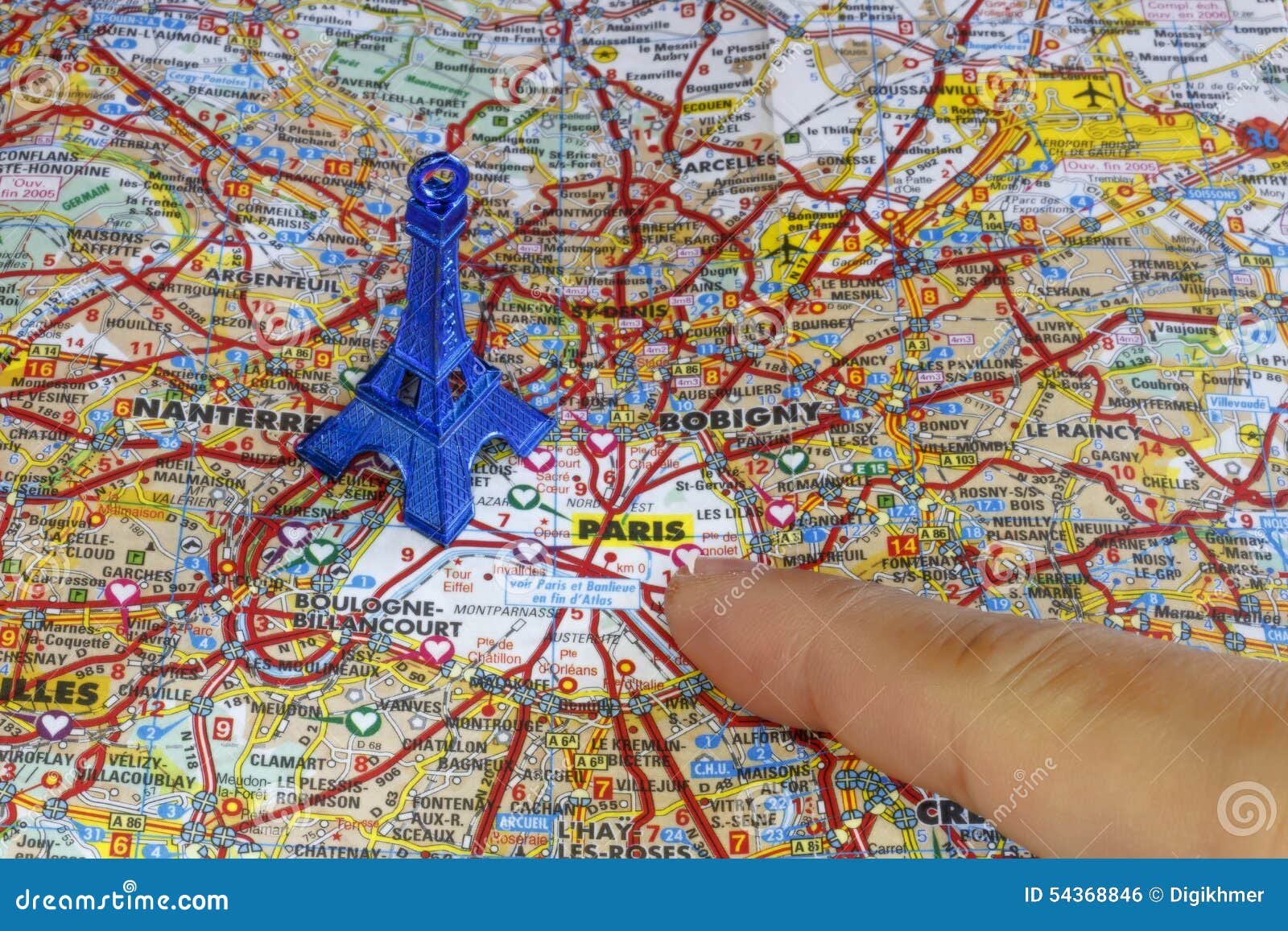 Showing Paris Map with a Blue Eiffel Tower Stock Photo - Image of books ...