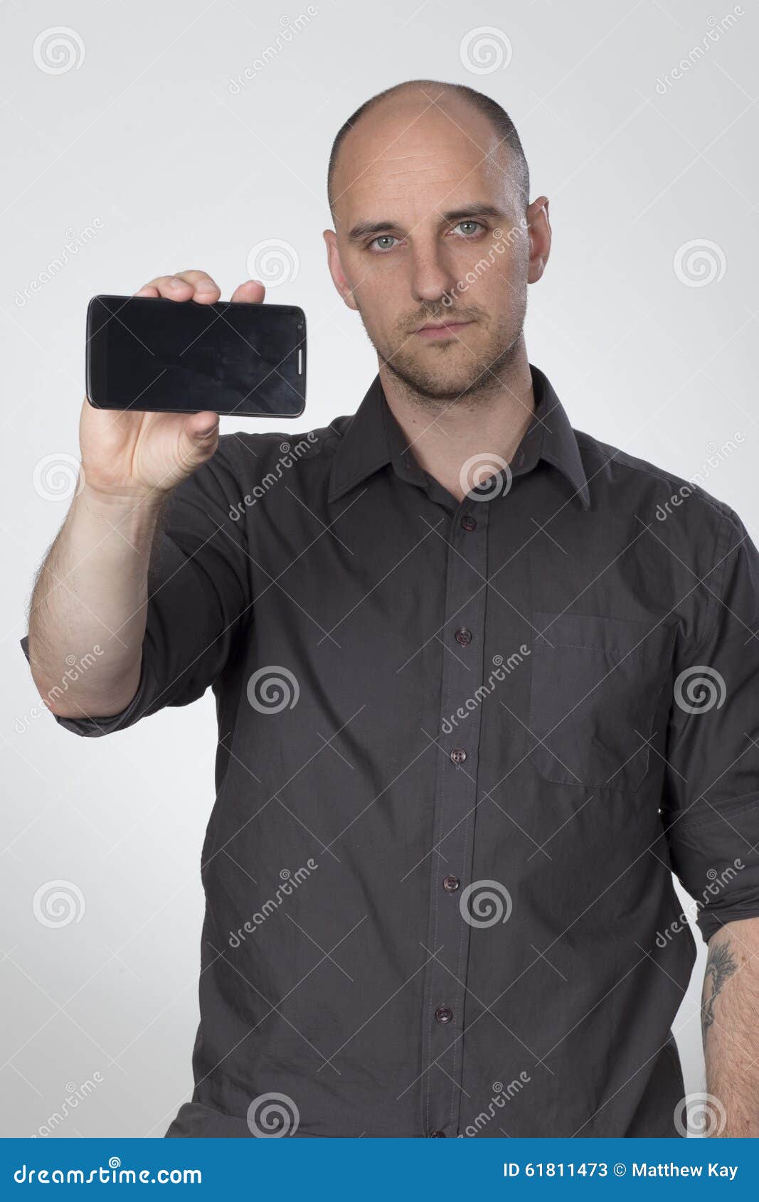 Showing a phone screen stock image. Image of person, human - 61811473