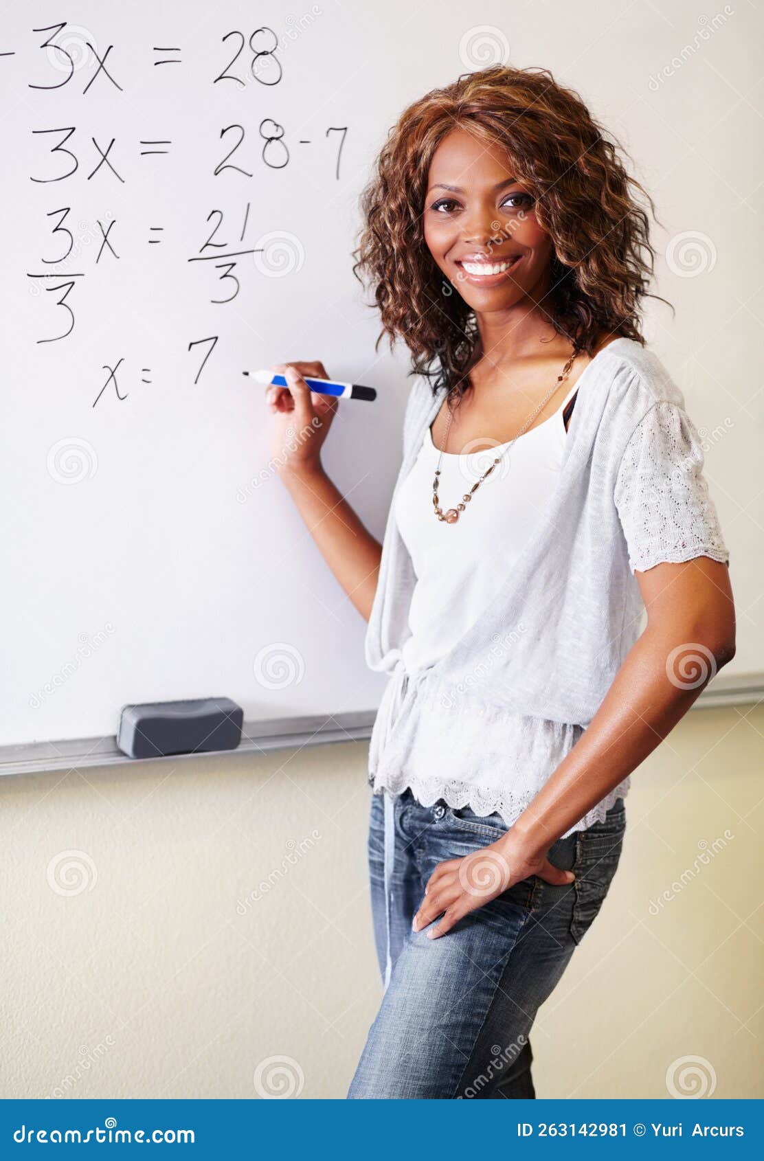Showing Them an Equation. a Gorgeous Young Maths Teacher Writing a Sum ...