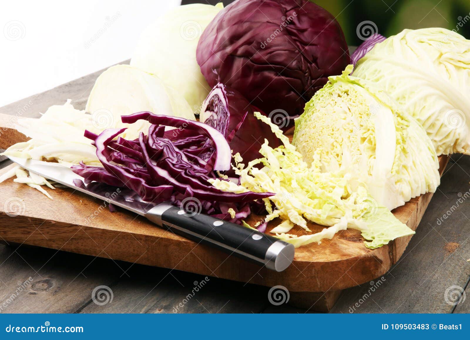 Shredded Cabbage, White Cabbage, Red Cabbage and Savoy on Cutting Board ...