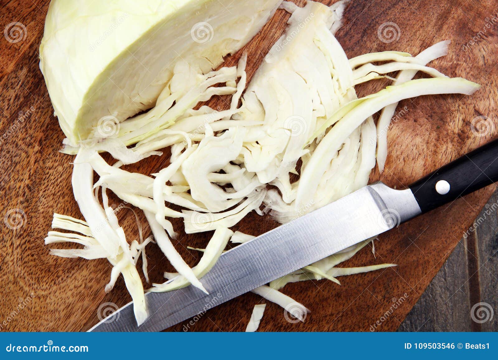 Shredded Cabbage, White Cabbage on Wooden Cutting Board. Stock Photo ...