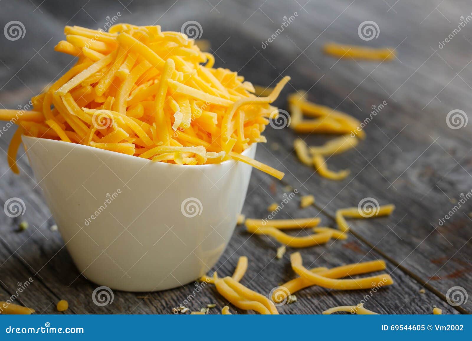 Shredded Cheddar Cheese Dish Angle Stock Photo | CartoonDealer.com ...